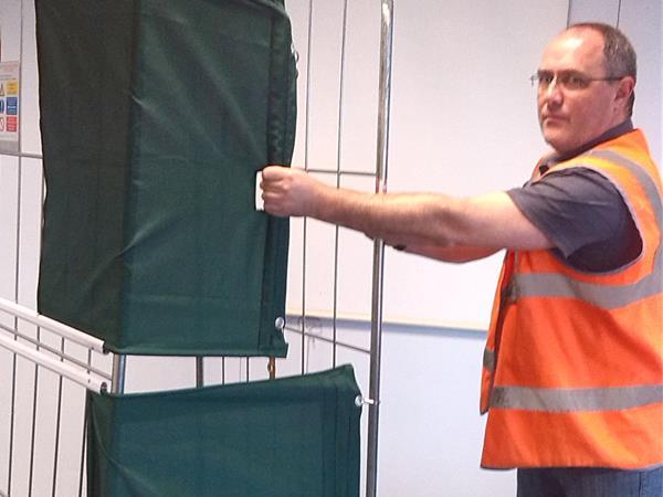 Tesco workers invent shrink wrap-free way of securing delivery cages ...