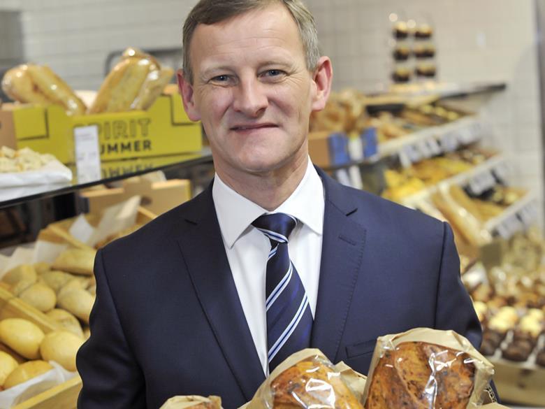 M&S chief executive Steve Rowe's earnings slashed by almost a third ...