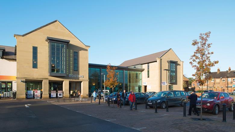 Booths losses halve after 'better than planned' sales rise | The Grocer